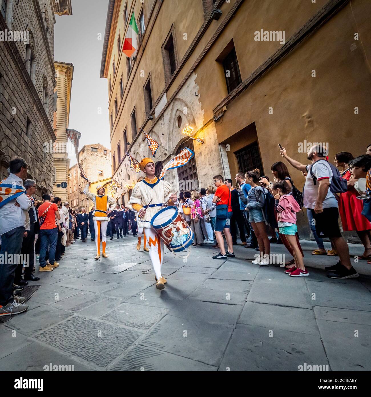 Corteo Storico. Men know as Contrada parading through Siena before the ...