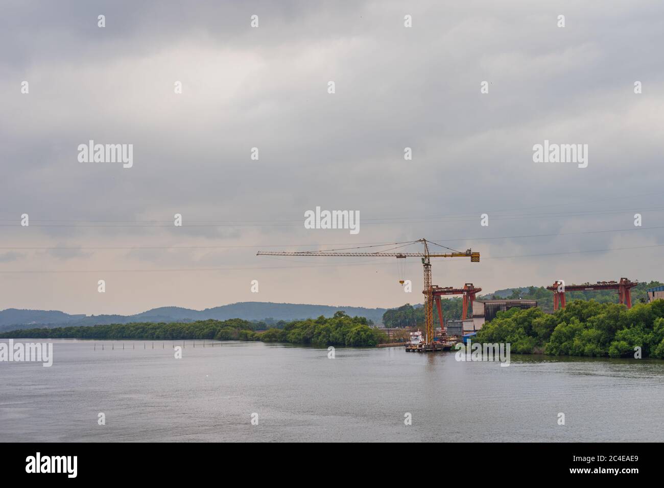 SOUTH GOA, INDIA - May 05, 2020: Barges carrying mining ore for export ...