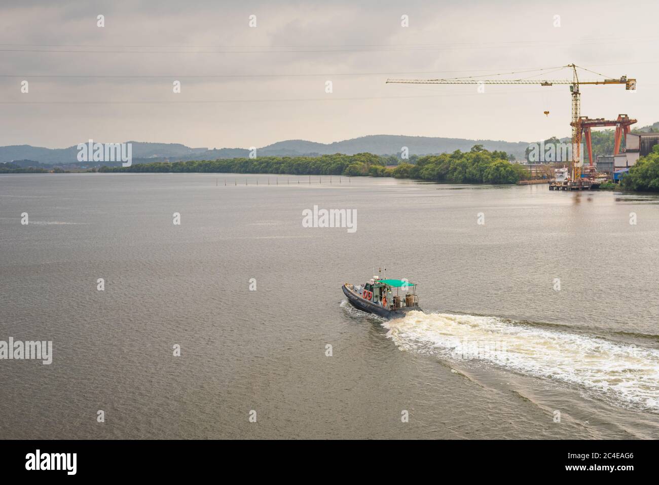 SOUTH GOA, INDIA - May 05, 2020: Barges carrying mining ore for export ...