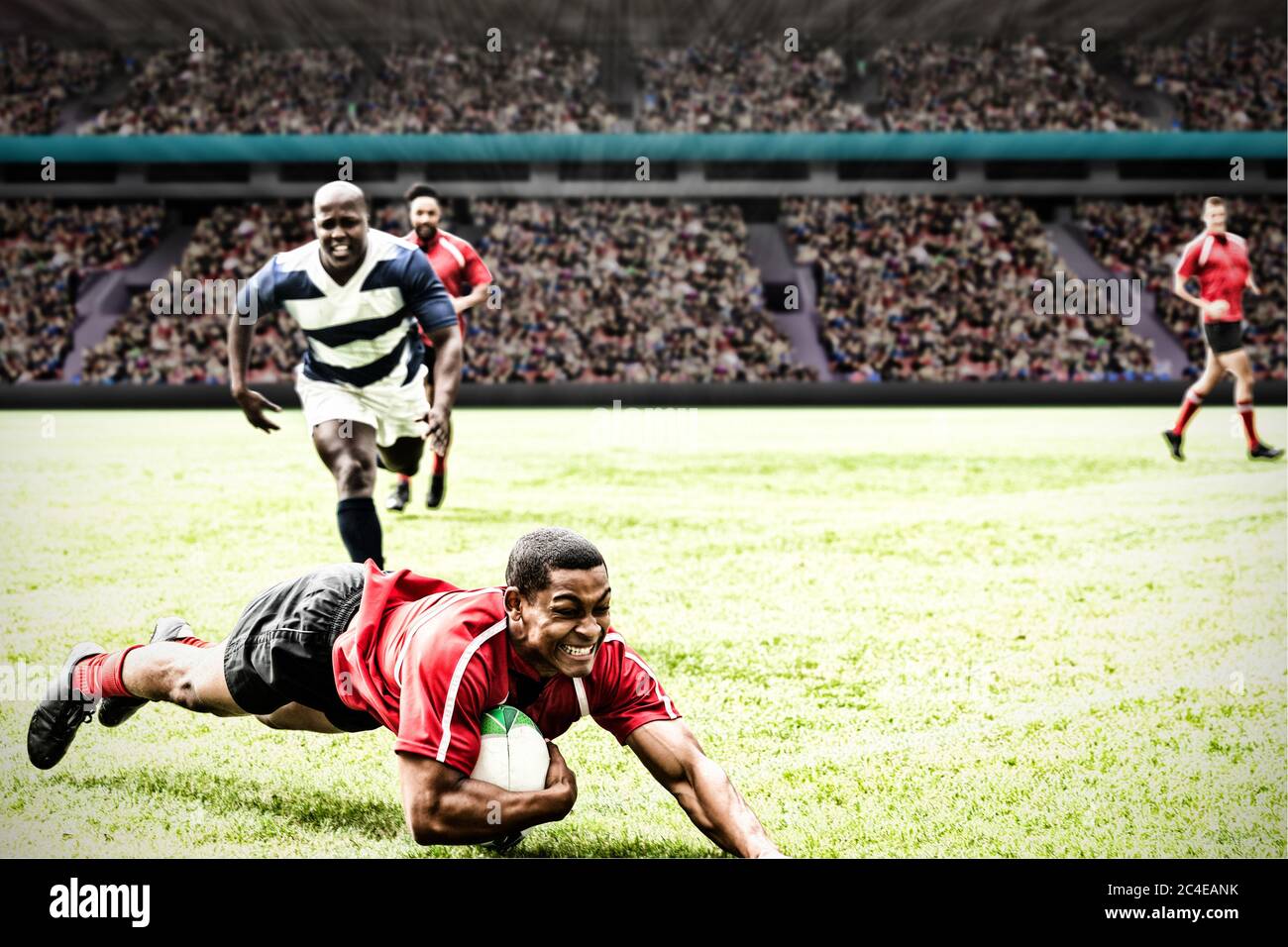 Digital composite image of rugby player jumping with the ball to score ...