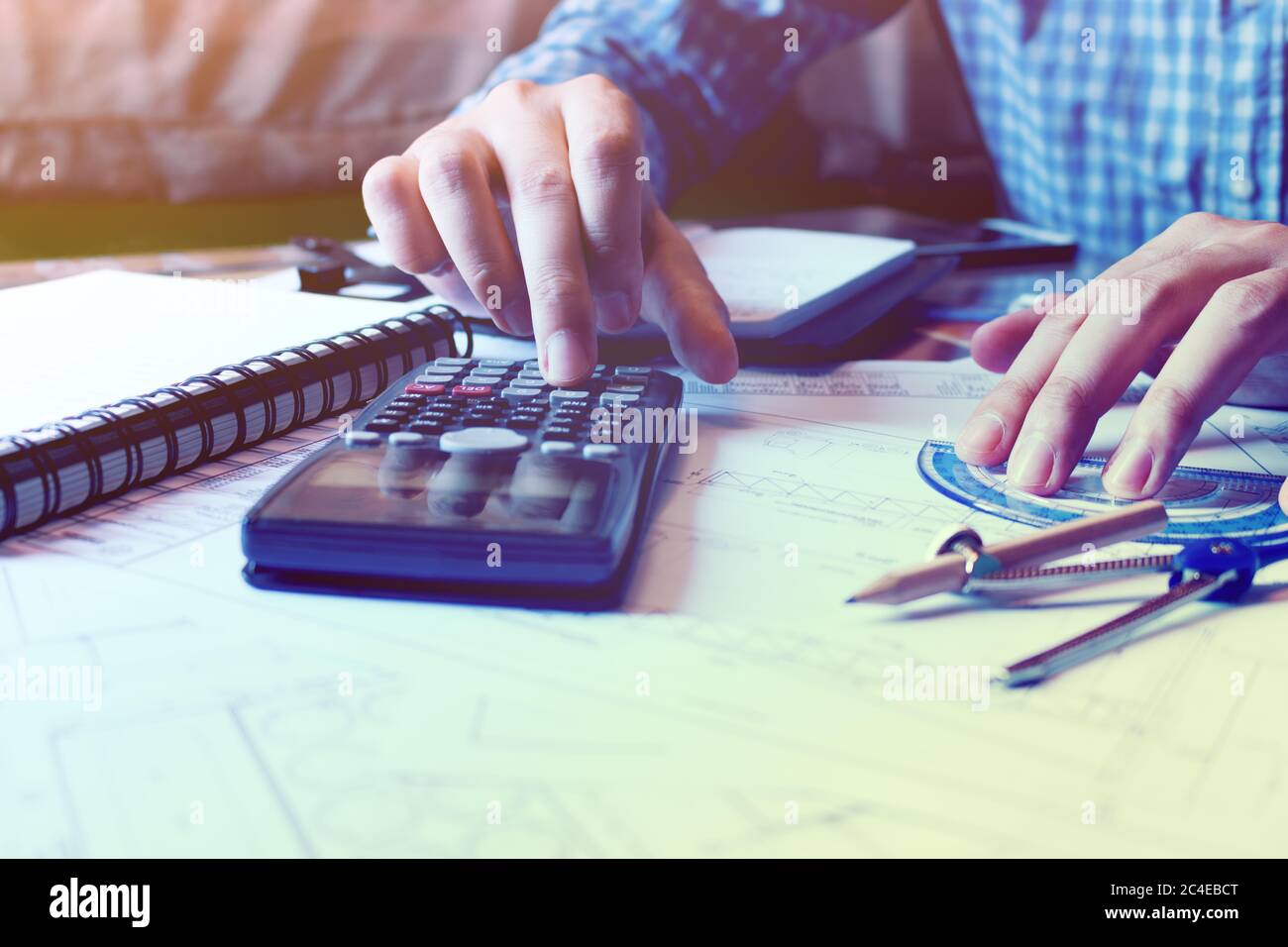 Architect man calculate building area on blueprint at office Stock ...