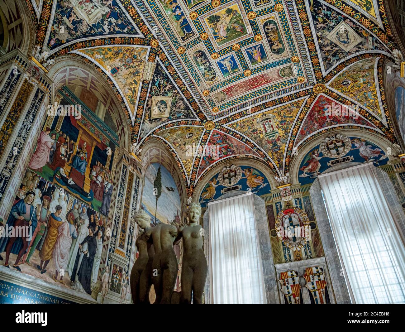 The ceiling of the Piccolomini Library by Pinturicchio, with the Three ...