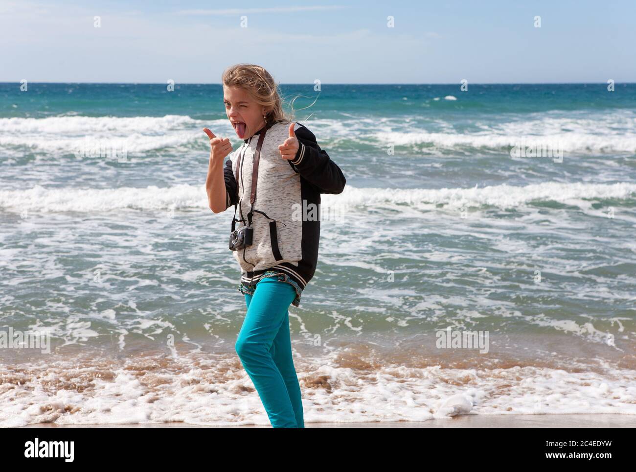 Girl camera around neck hi-res stock photography and images - Alamy