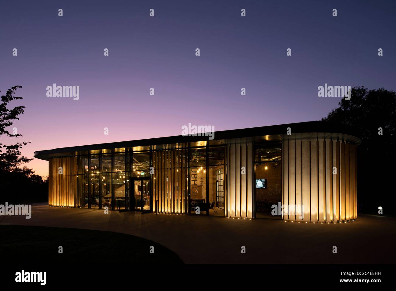 Dusk view of the Clubhouse with lighting. The Clubhouse, Uxbridge ...