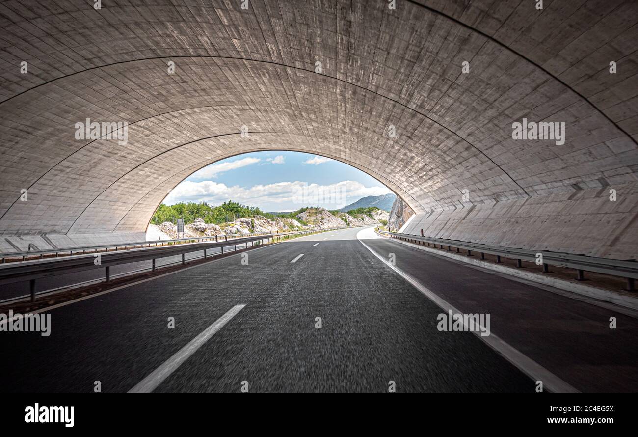 Freeway through the tunnel Stock Photo - Alamy