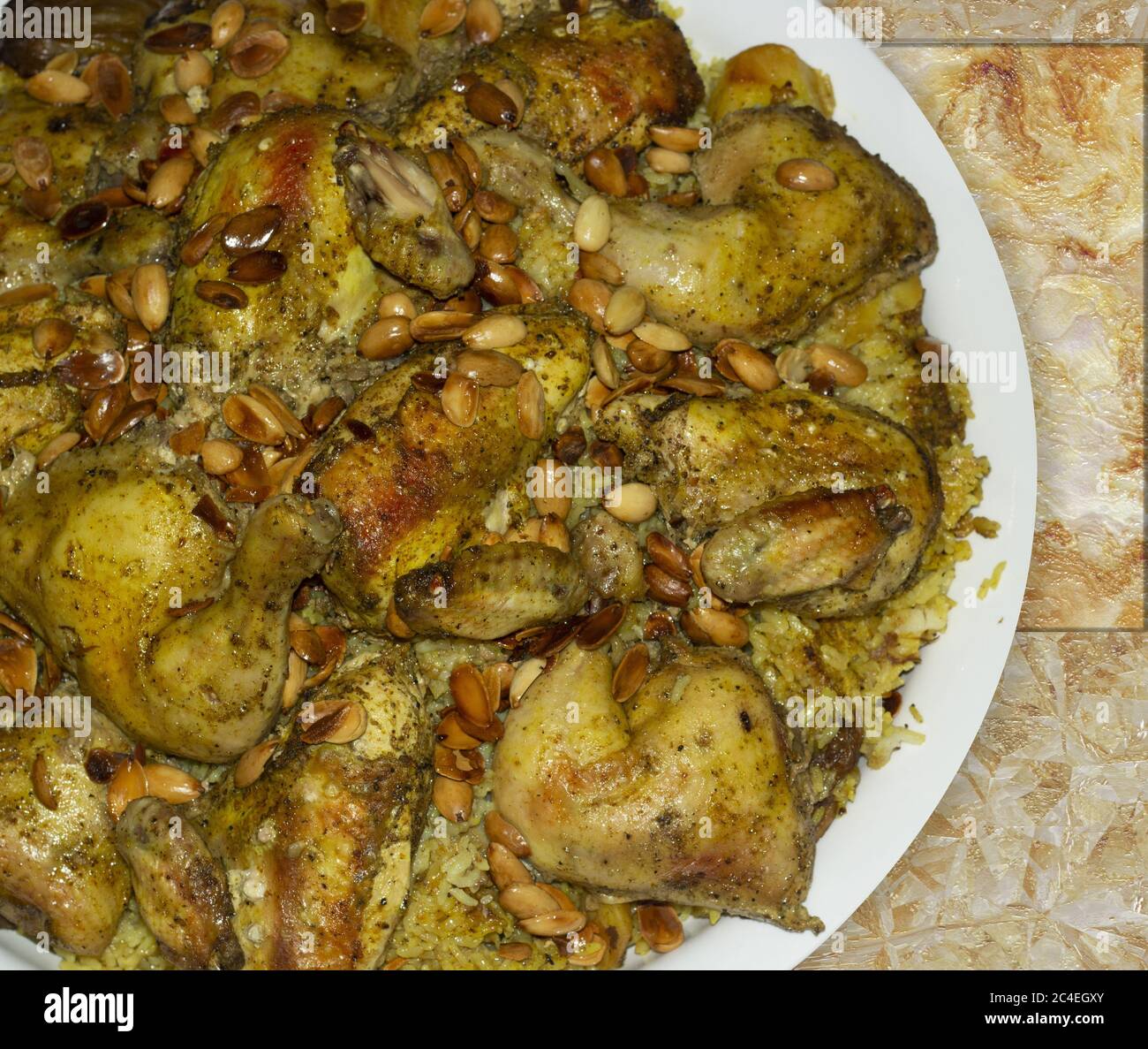 Closeup shot of chicken Kabsa with rice in a white plate - homemade ...