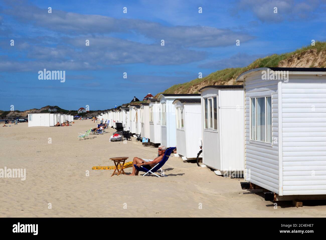 White sand beach and huts on North Sea coast, Lokken, Jutland, Denmark ...