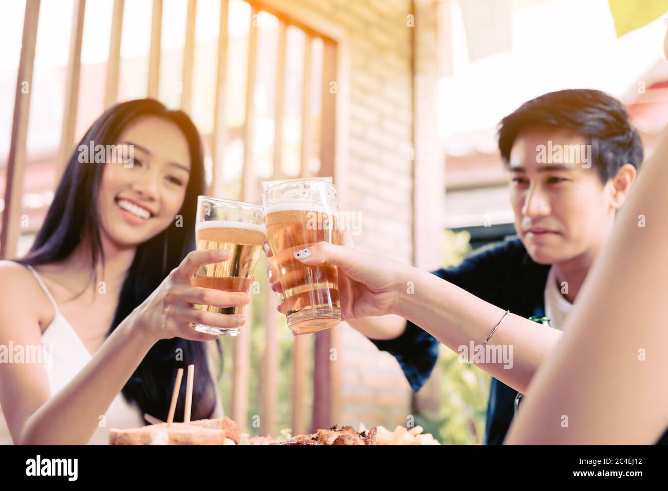 Group of young friends drinking beer at restaurant after work Stock ...