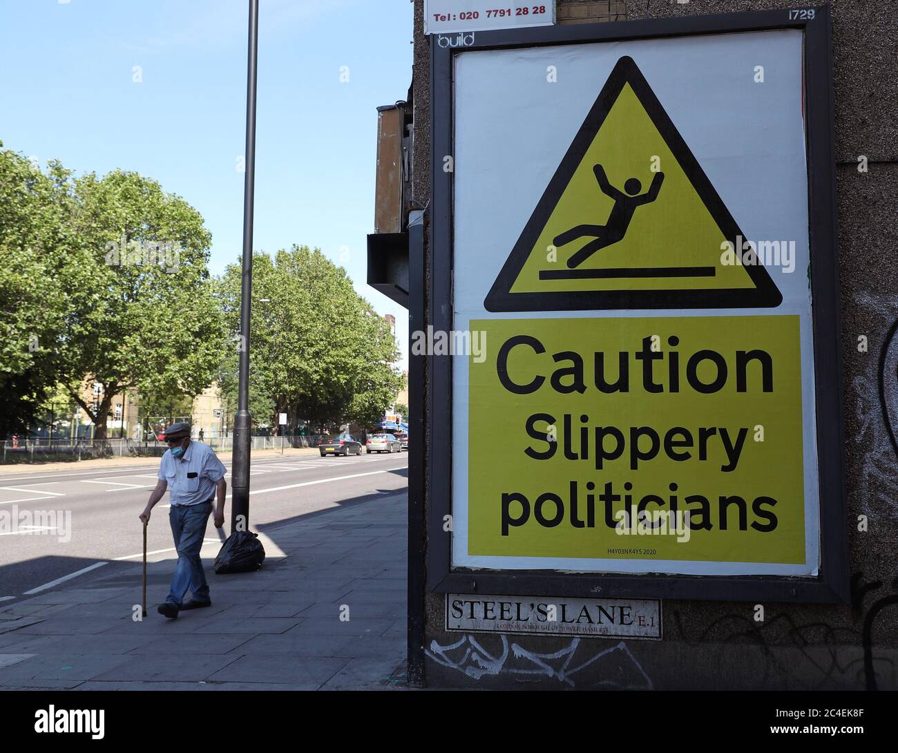 A piece of street art warning 'Caution Slippery politicians', entitled ...