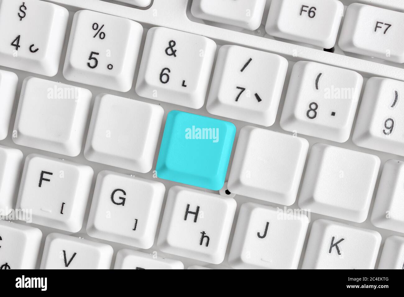 Different Colored Keyboard key With Accessories Arranged On Empty copy ...
