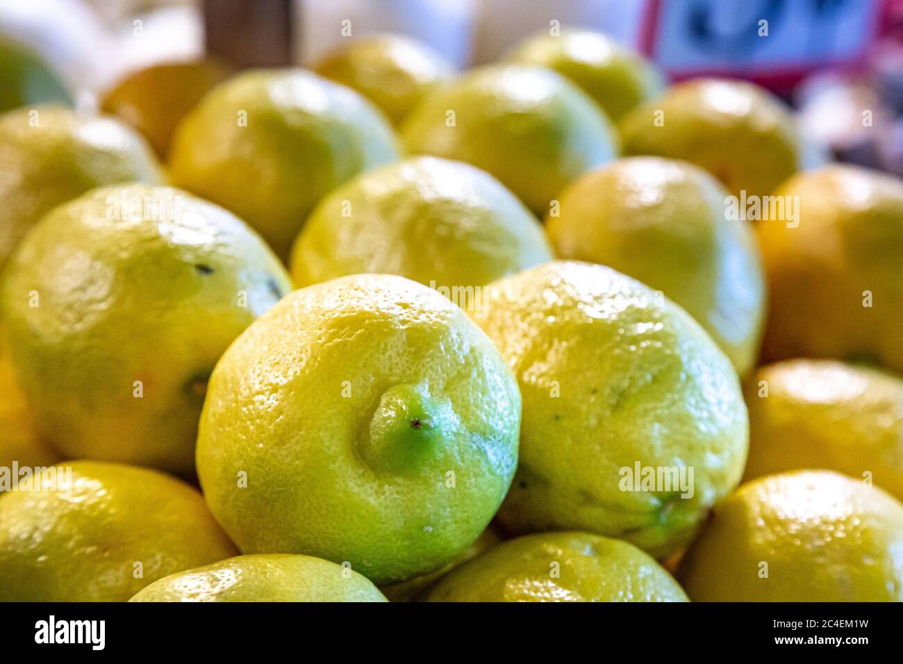 Lemons for sale on a market stall, with a shallow depth of field Stock ...