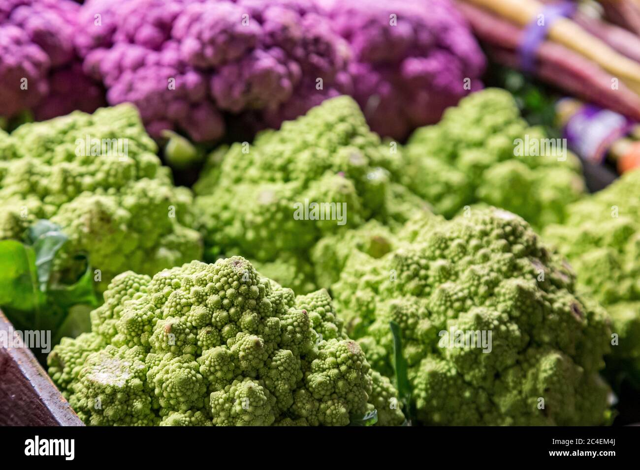 Pretty green romanesco for sale on a market stall Stock Photo - Alamy