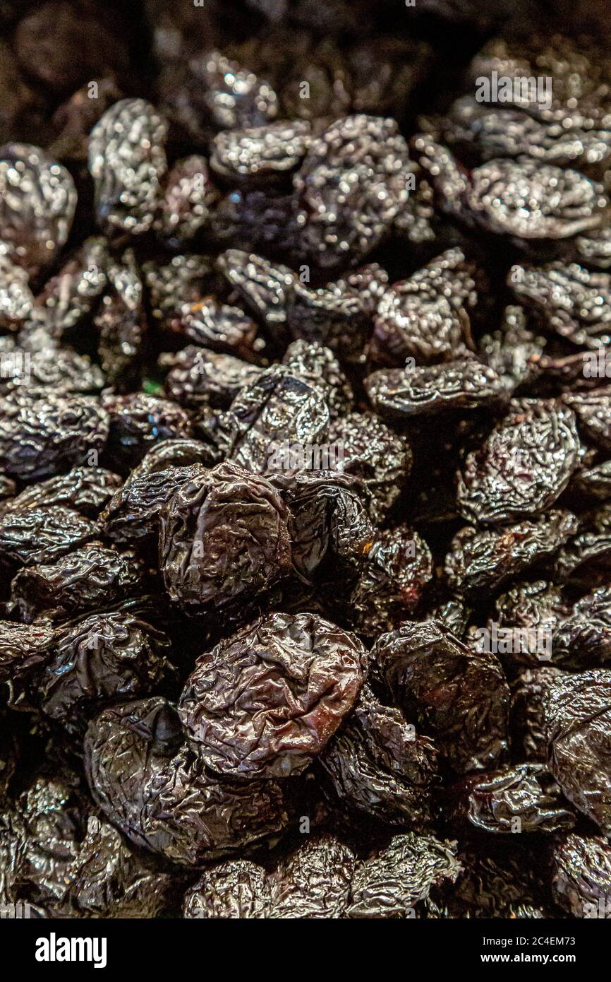 A full frame photograph of prunes for sale on a market stall Stock ...