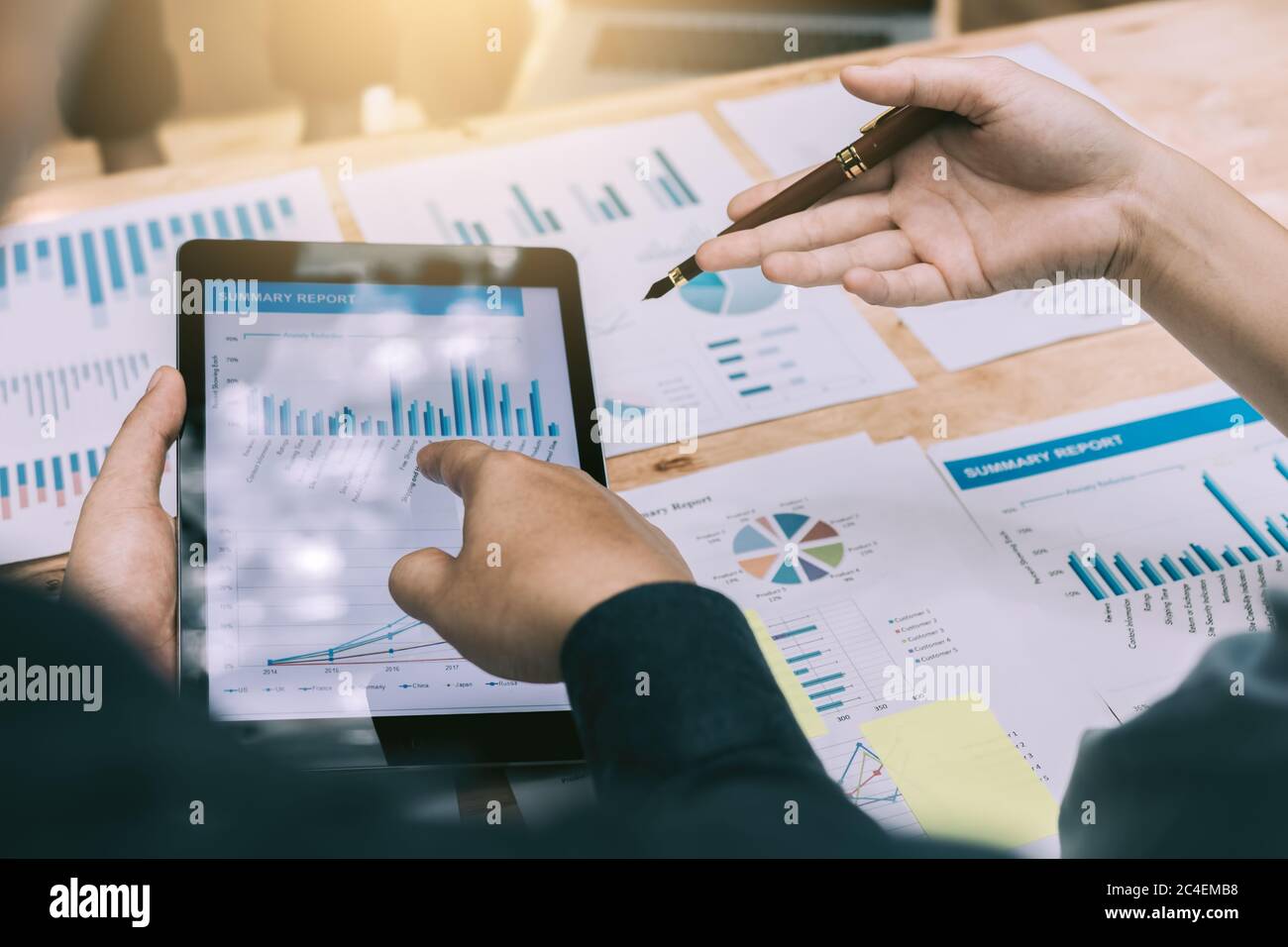 Business people analysis with graph on digital tablet at room office ...