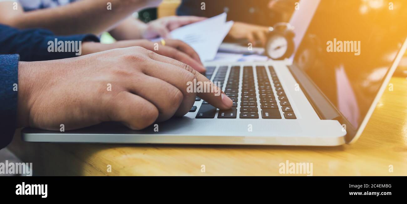 Close up human hand typing keyboard laptop Stock Photo - Alamy