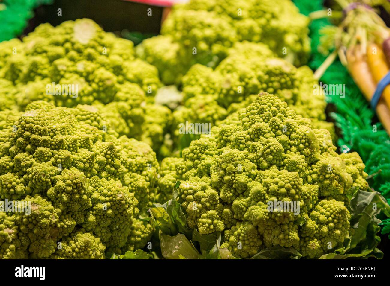 Pretty green romanesco for sale on a market stall Stock Photo - Alamy