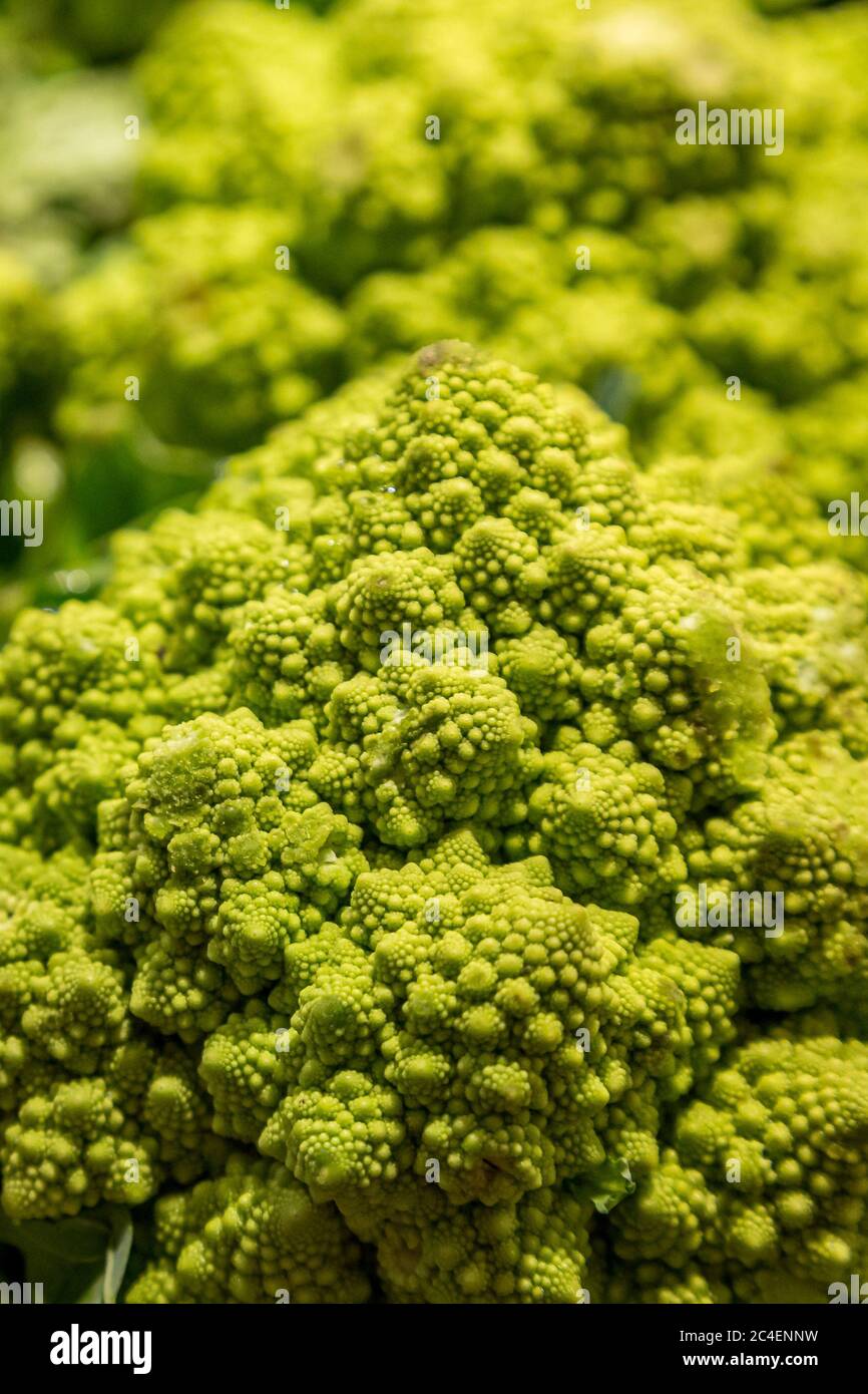 Pretty green romanesco for sale on a market stall Stock Photo - Alamy
