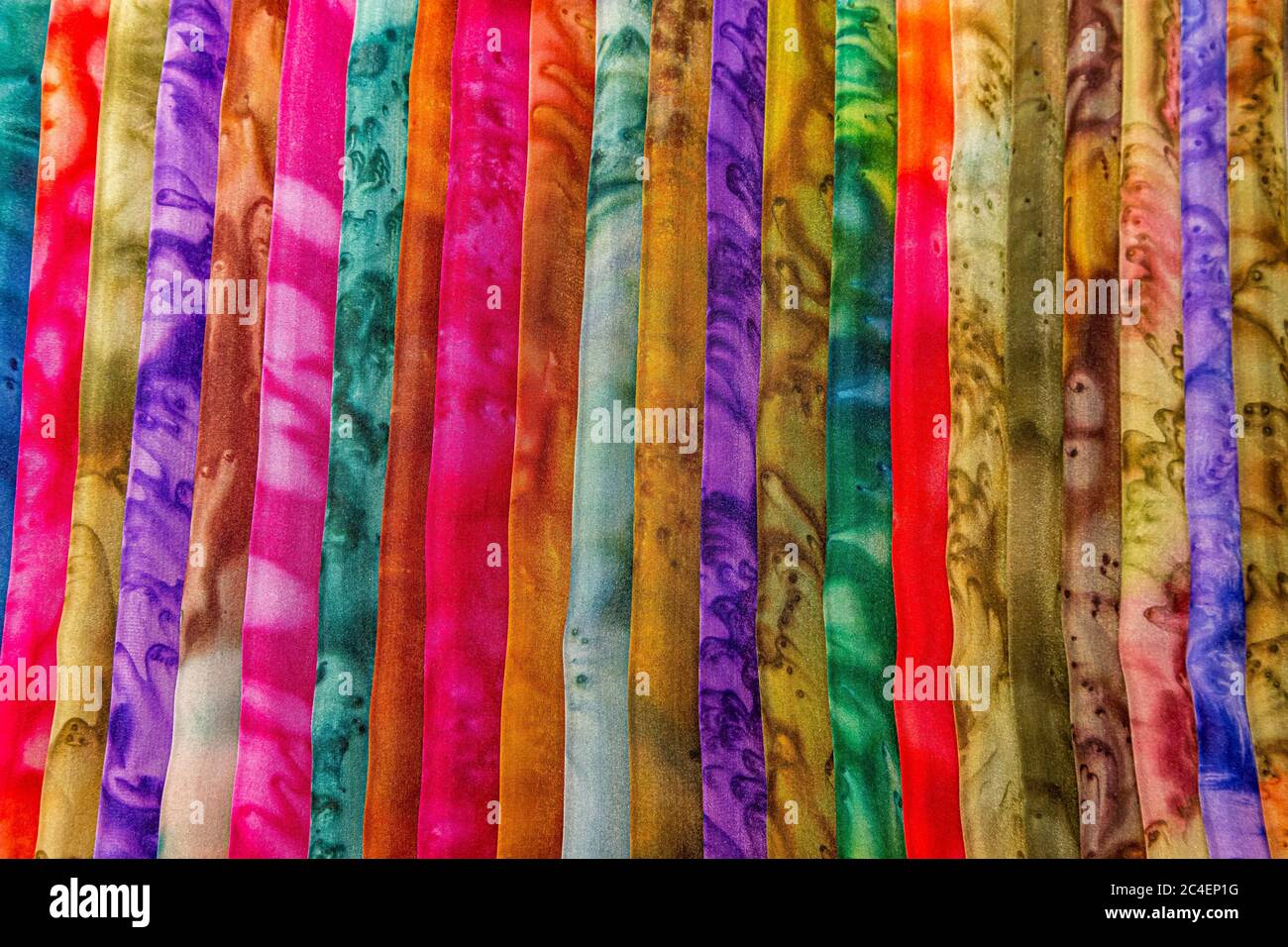 A full frame photograph of a display of colourful material Stock Photo ...
