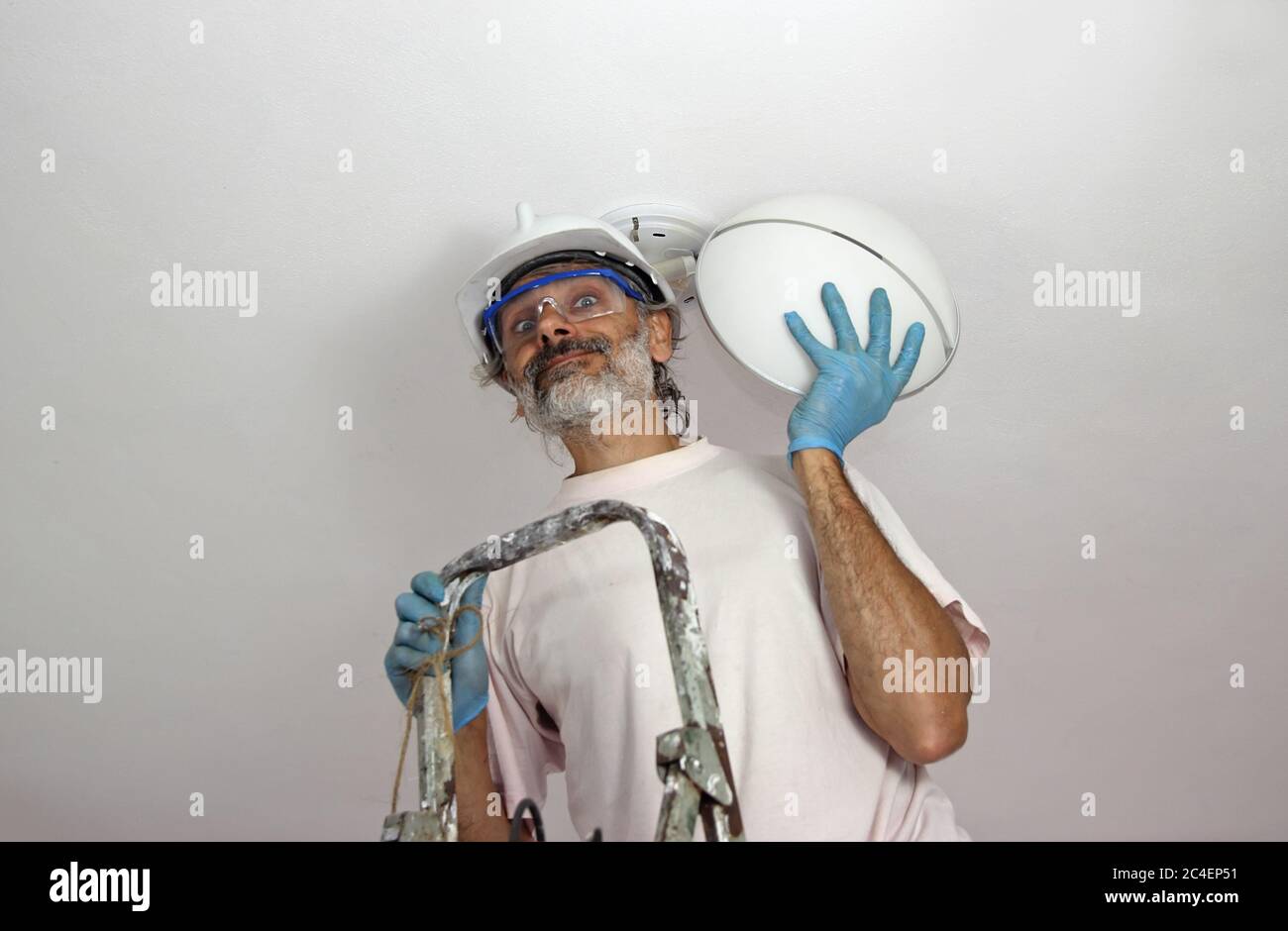Ladder ceiling man hi-res stock photography and images - Alamy