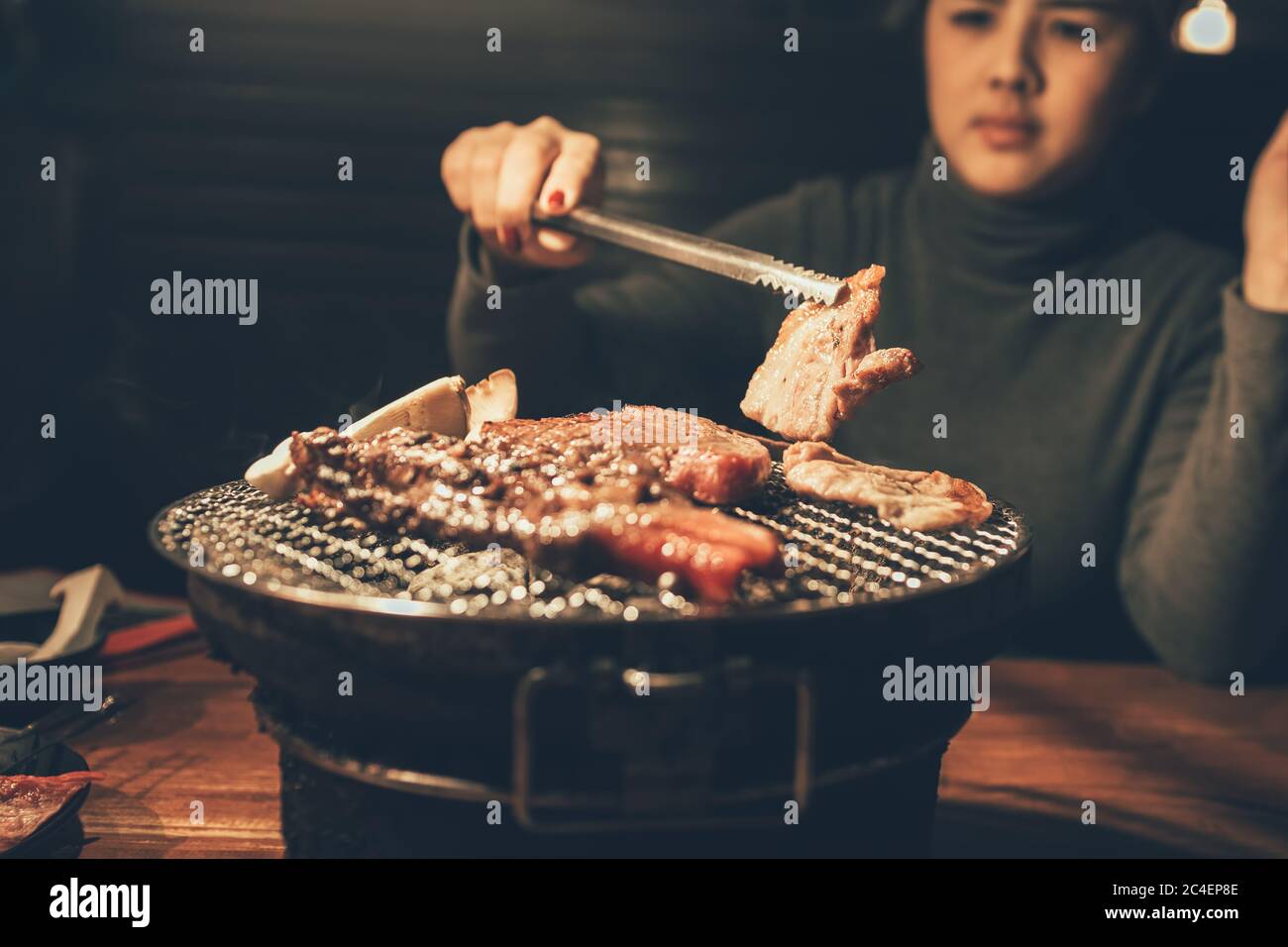 Grill Meat Woman Restaurant High Resolution Stock Photography and ...