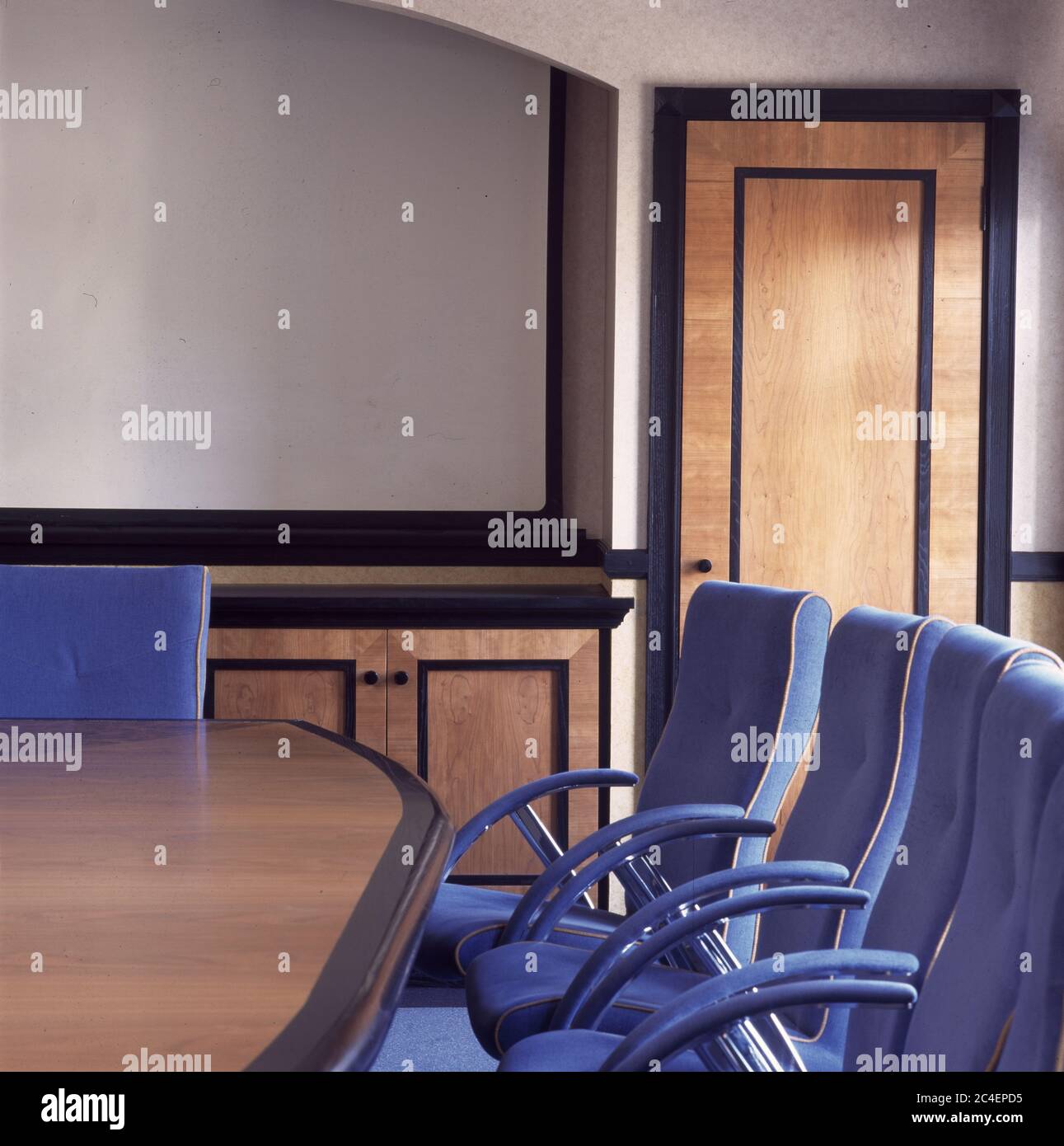 Closeup of boardroom with multi-media screen Stock Photo - Alamy