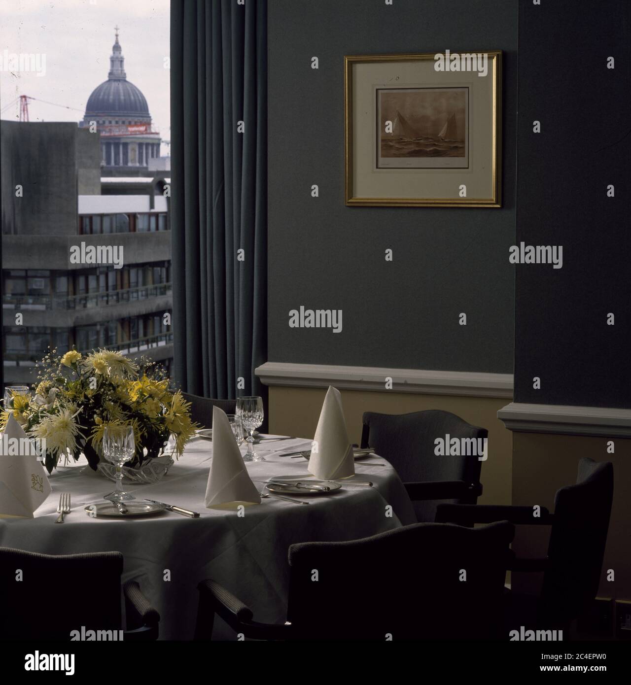 Round restaurant table with view of St.Pauls through window Stock Photo ...