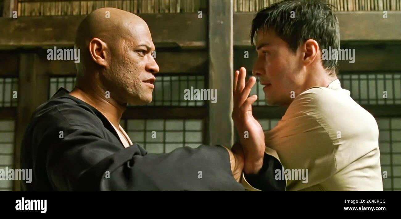 USA. Keanu Reeves, and Laurence Fishburne in a scene from the ©Warner ...