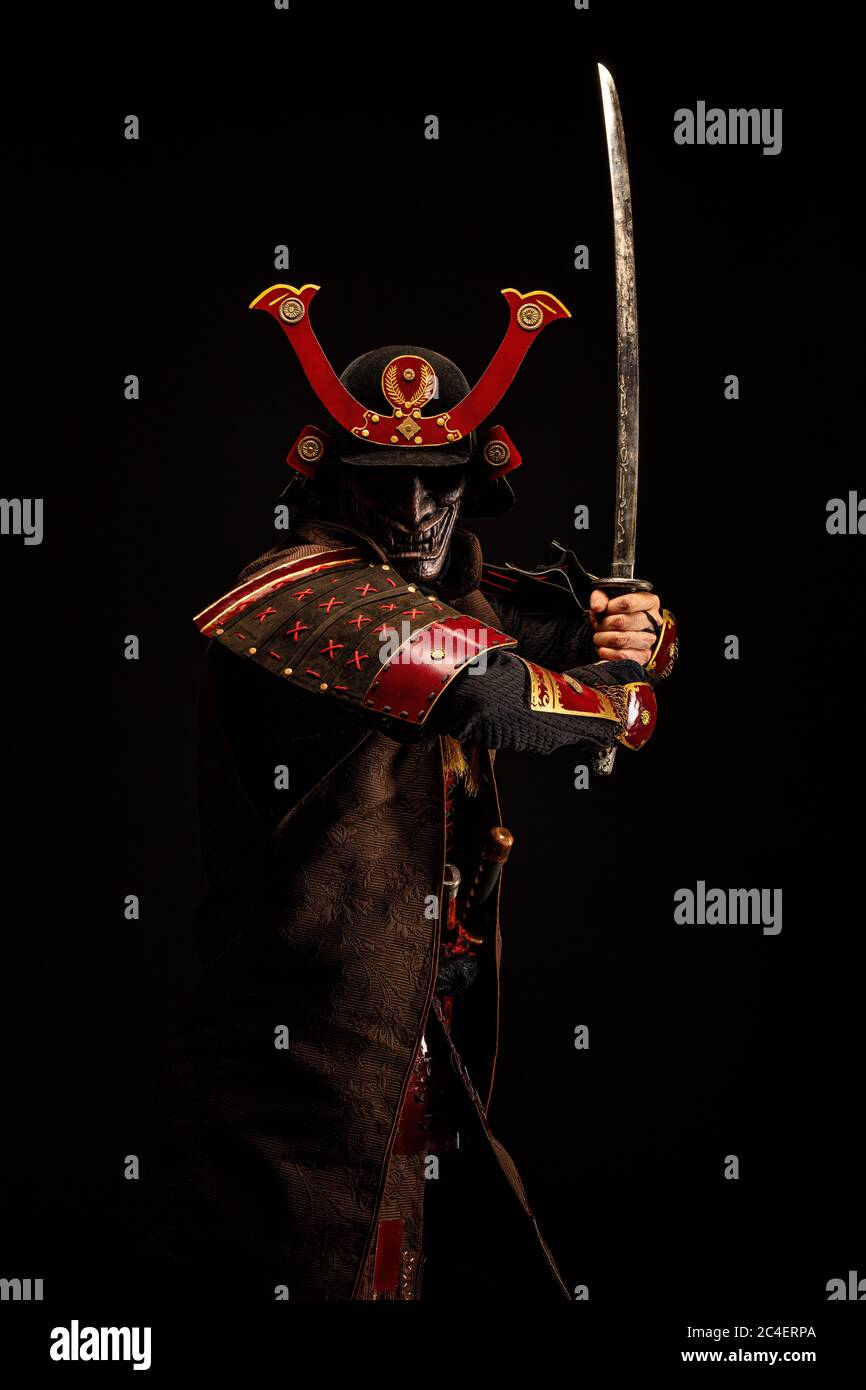 Portrait of a samurai in armor in attack position Stock Photo - Alamy