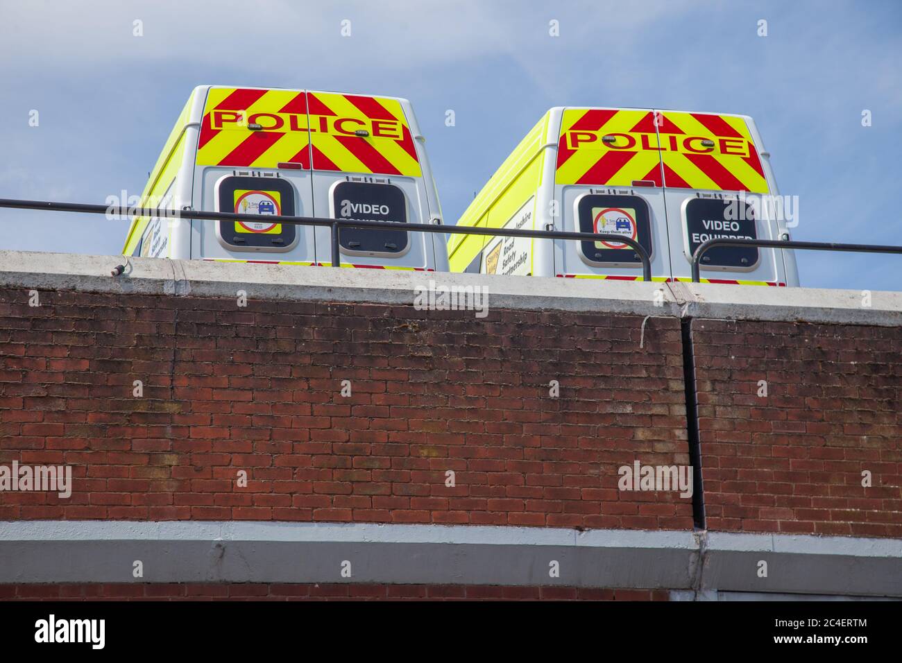 Parked police emergency service vehicle in rooftop carpark lincoln ...
