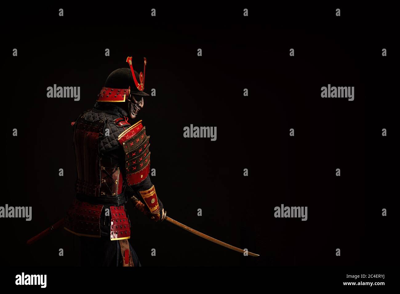 Portrait of a samurai in armor in attack position Stock Photo - Alamy