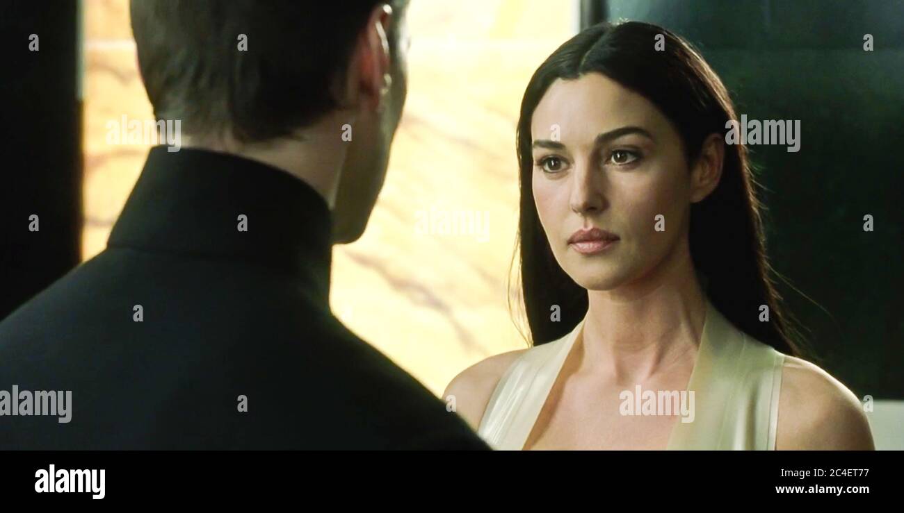 USA. Keanu Reeves and Monica Bellucci in a scene from the ©Warner Bros ...