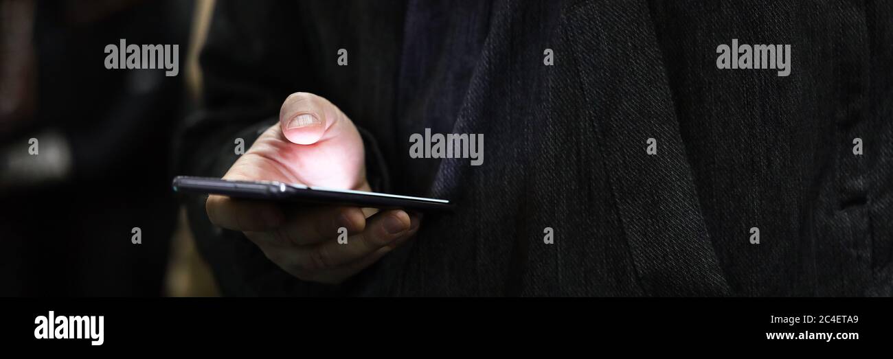 Light of mobile phone at night, person using cell Stock Photo - Alamy