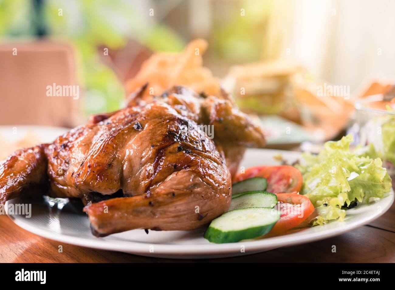 Grilled chicken on the table Stock Photo - Alamy