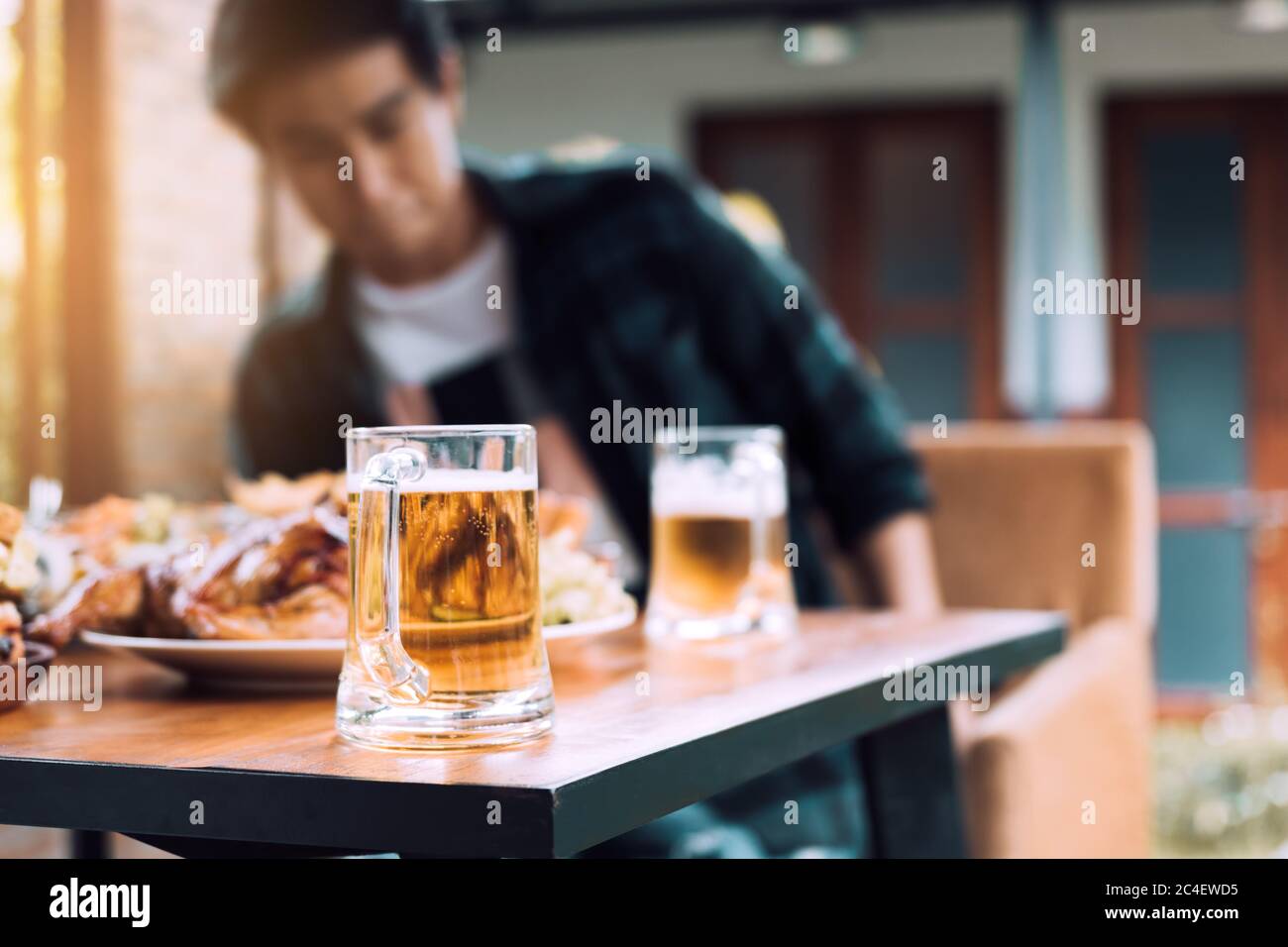 Guys drinking in a lonely night Stock Photo - Alamy