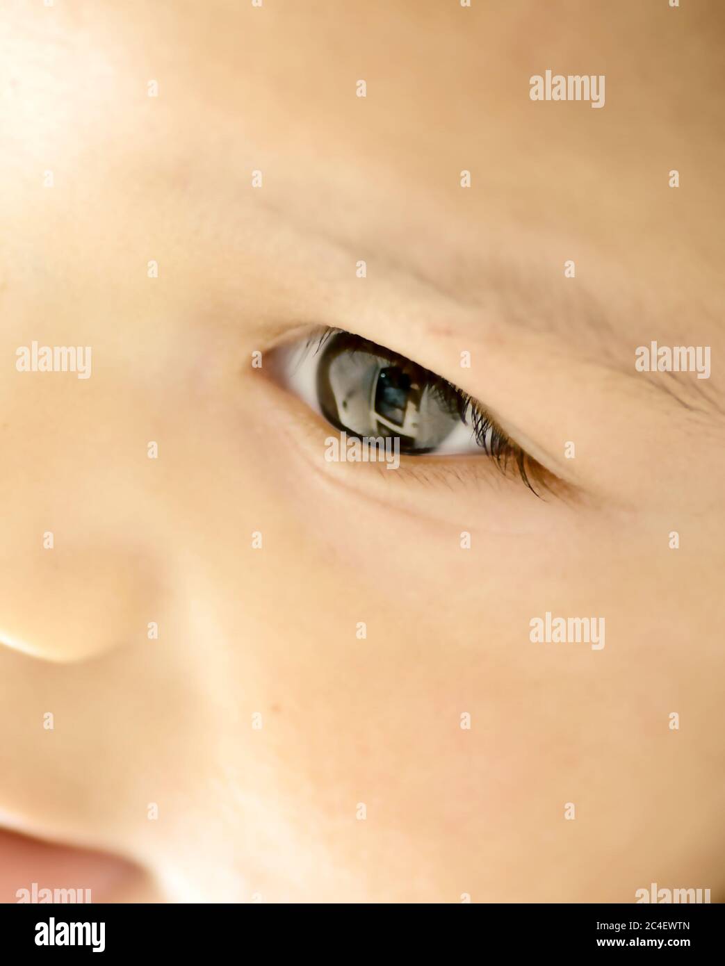 Closeup image of a baby face with eyes in focus Stock Photo - Alamy