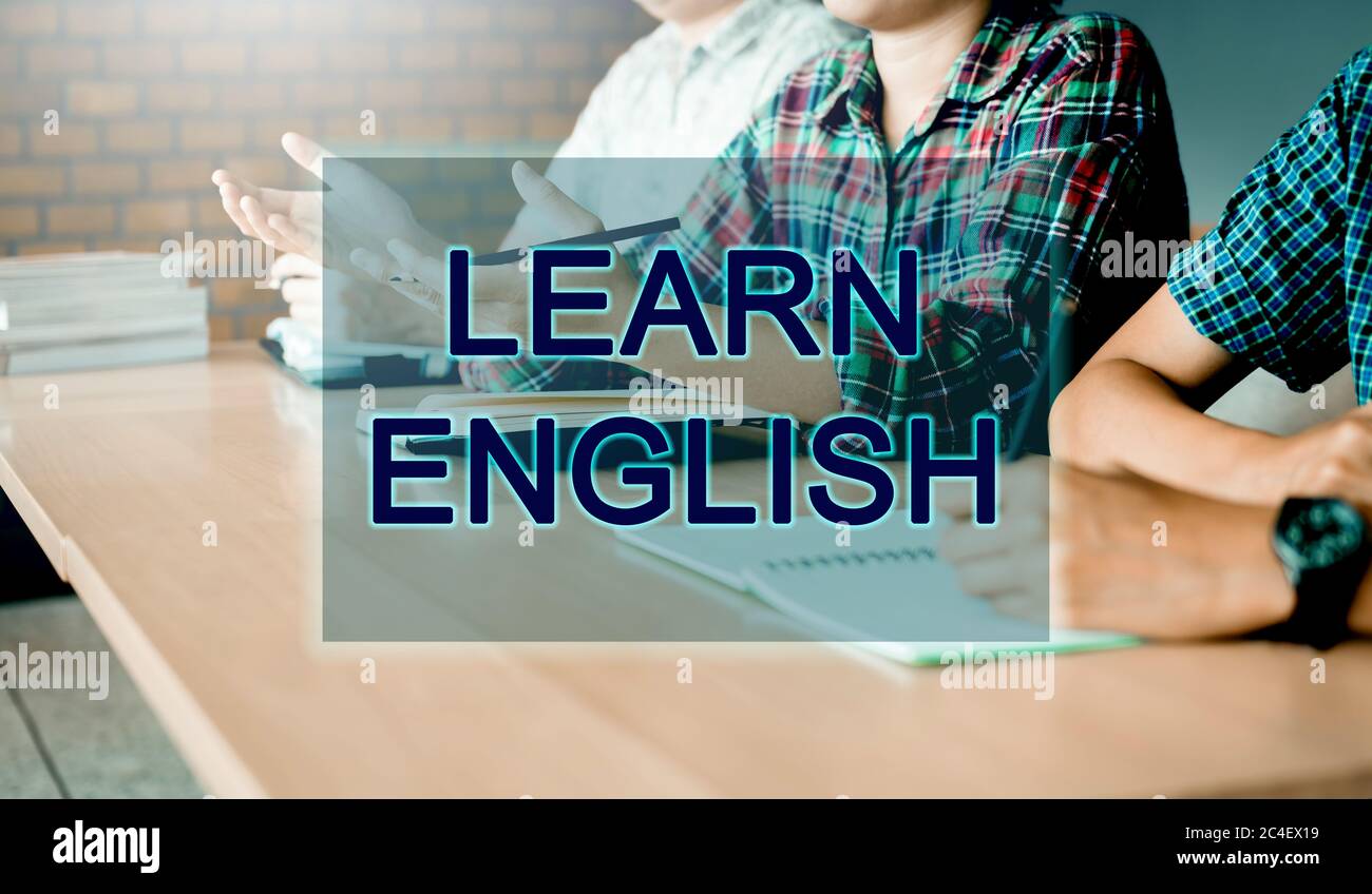 College students learning in class room and having fun with learn ...