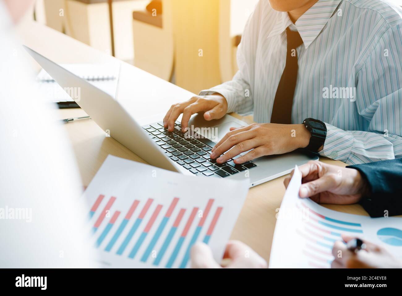 Team business people analysis summary report graph in office room Stock ...