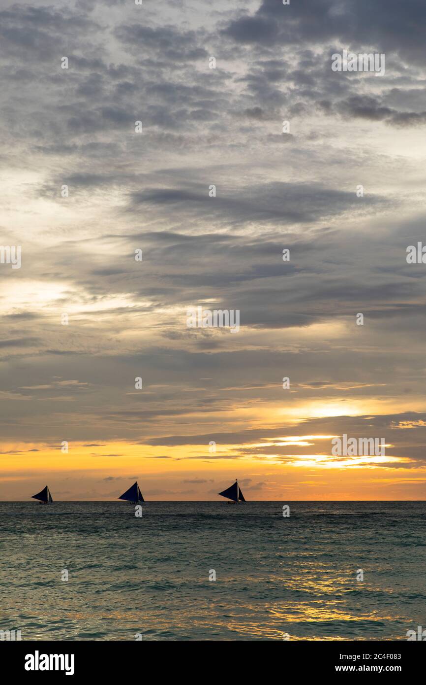 White beach sunset on Boracay island, Philippines Stock Photo - Alamy