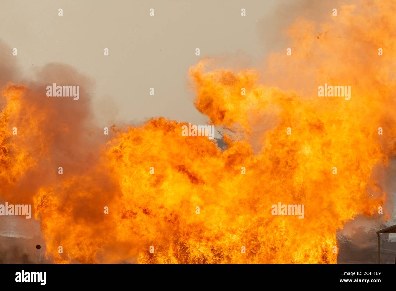 Massive orange fire explosion in military combat and war. Vehicle ...