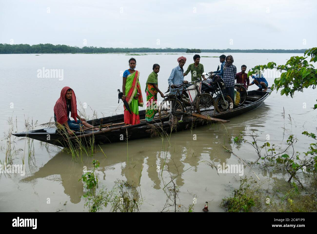 Indian People Walk In Flood High Resolution Stock Photography and ...