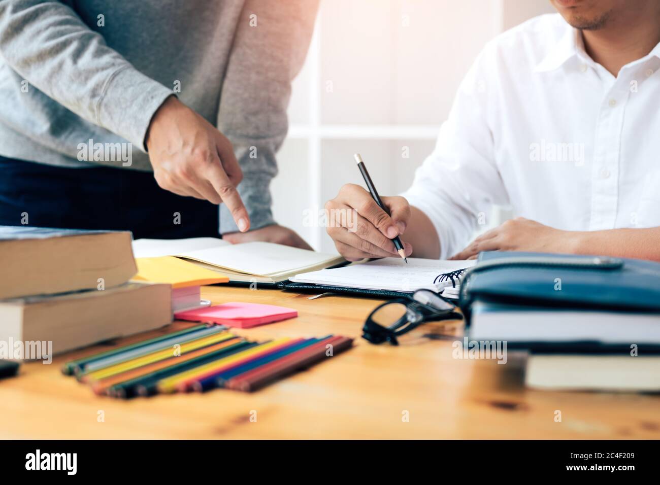 Group of students are writing a university test Stock Photo - Alamy