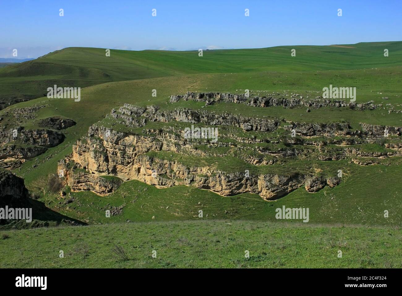 Azerbaijan. Beautiful, spring mountains in the green grass Stock Photo ...