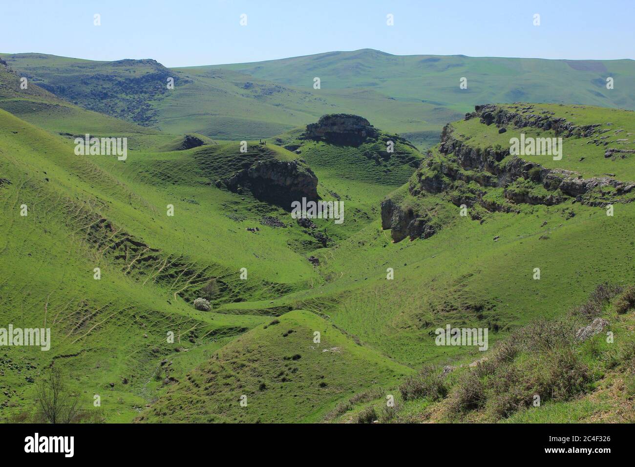 Azerbaijan. Beautiful, spring mountains in the green grass Stock Photo ...