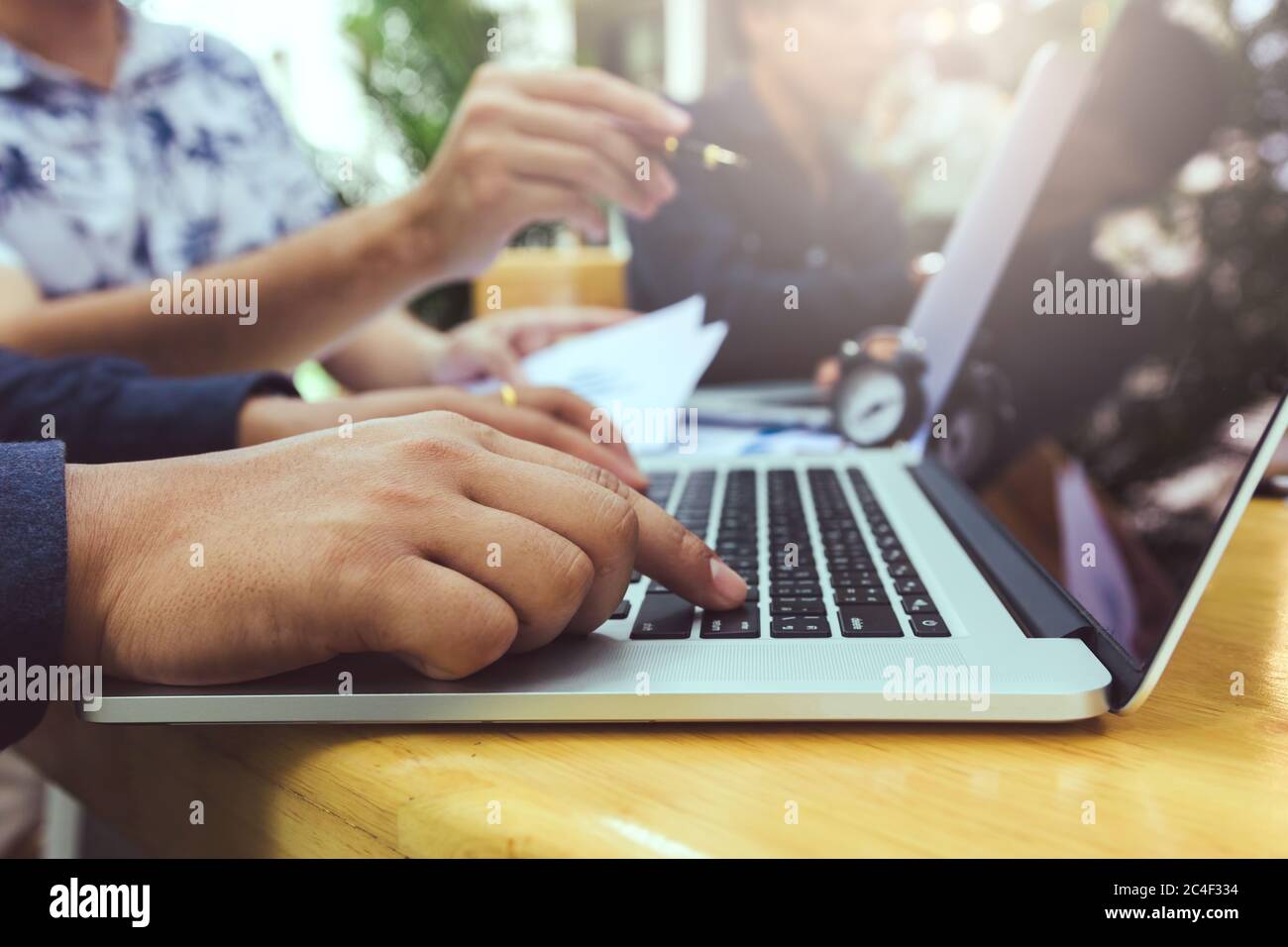Close up human hand typing keyboard laptop Stock Photo - Alamy