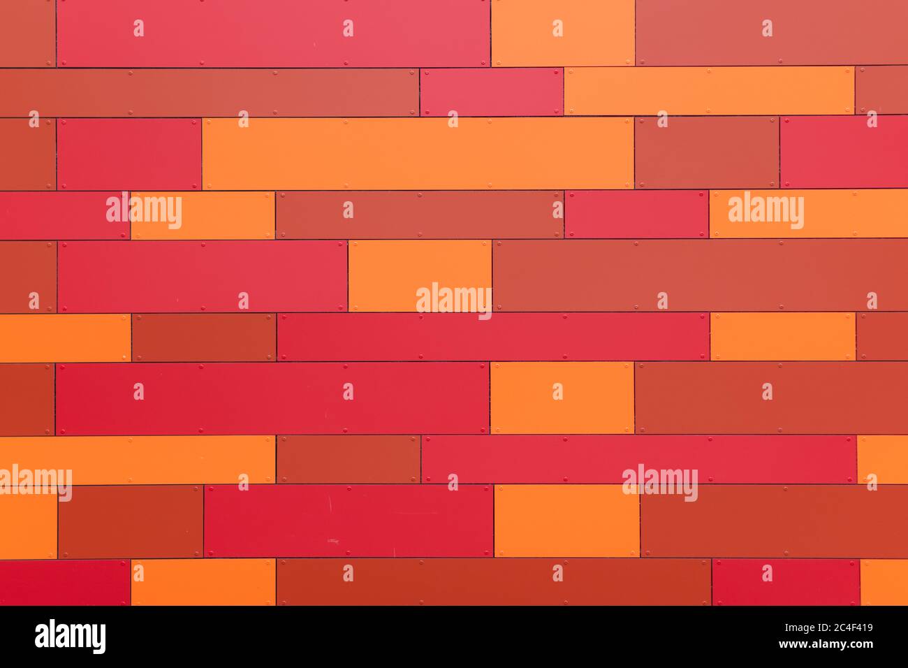 Rectangular pattern in different shades of red as a background, orange ...