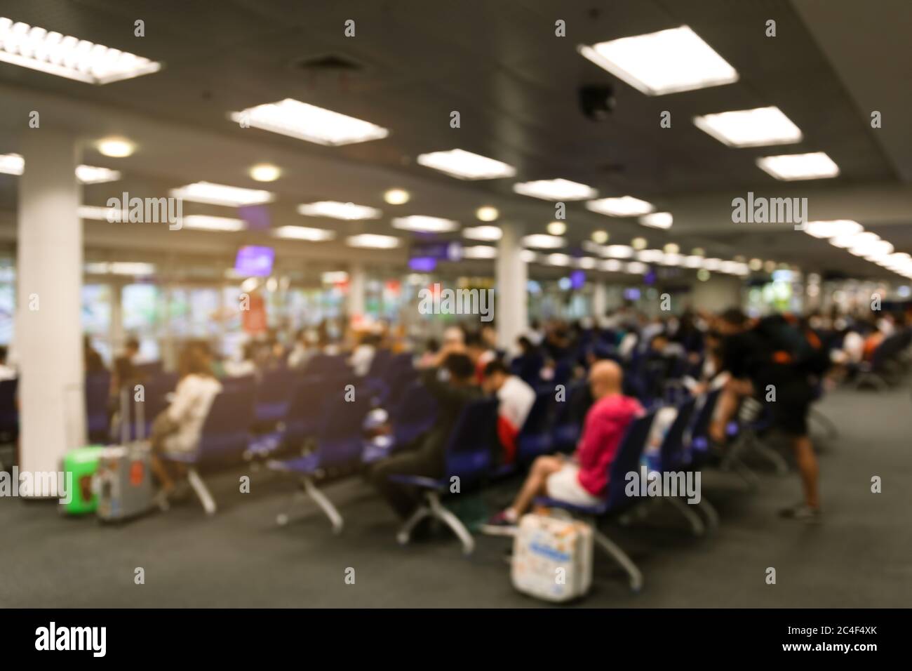 Blur of queue people check in at terminal airport Stock Photo - Alamy