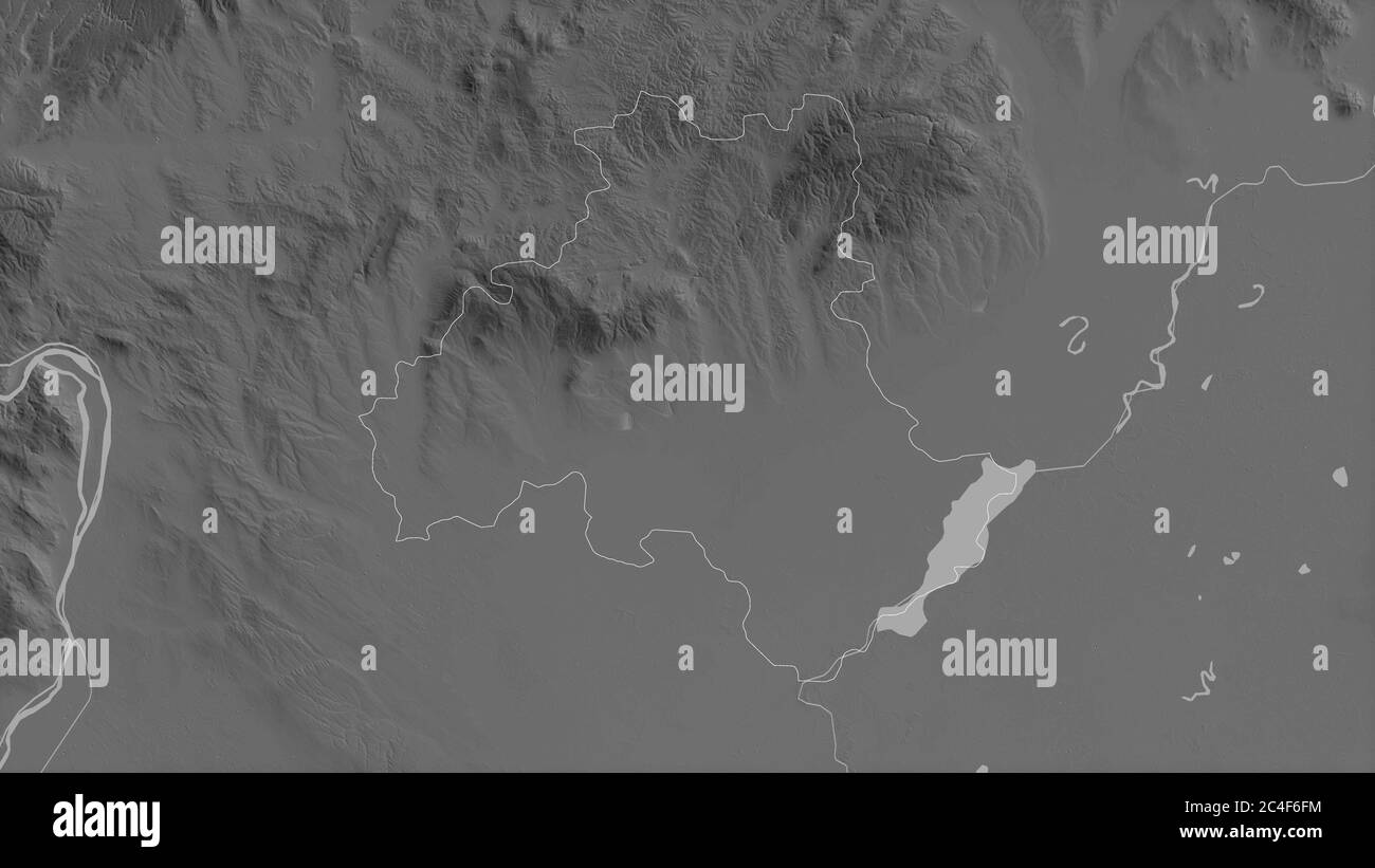 Heves, county of Hungary. Grayscaled map with lakes and rivers. Shape outlined against its ...