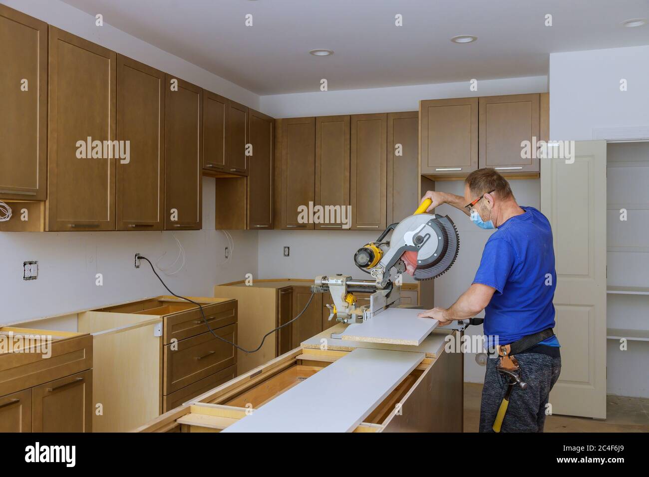 Worker protects himself from covid-19, man cut using circular saw ...