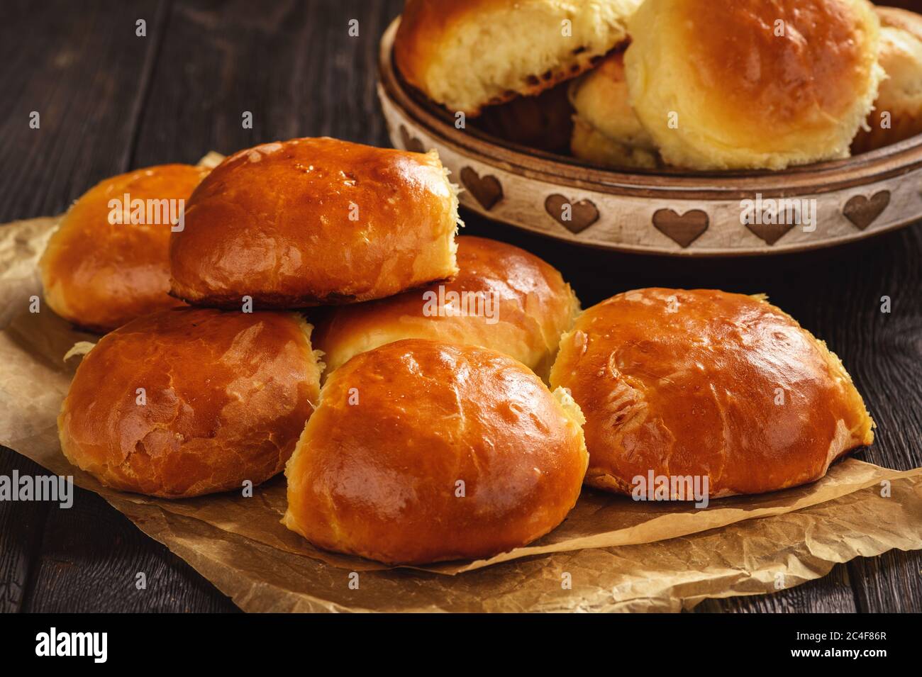 Homemade sweet bread rolls on dark background Stock Photo - Alamy