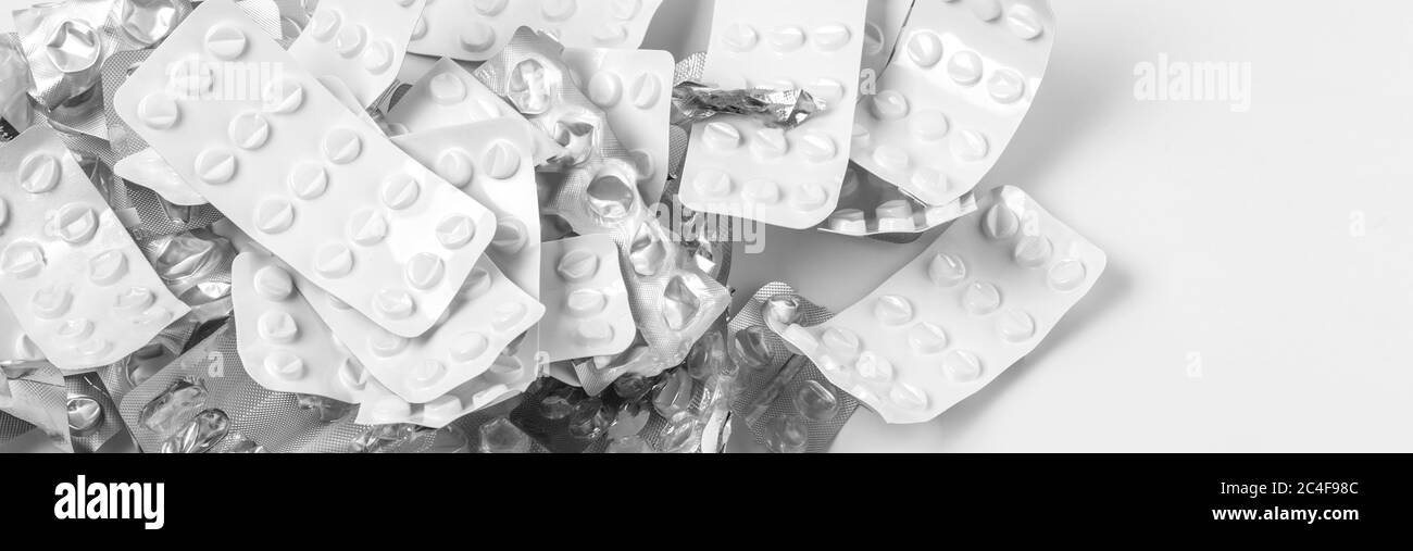 empty packaging of pills on a white background Stock Photo - Alamy